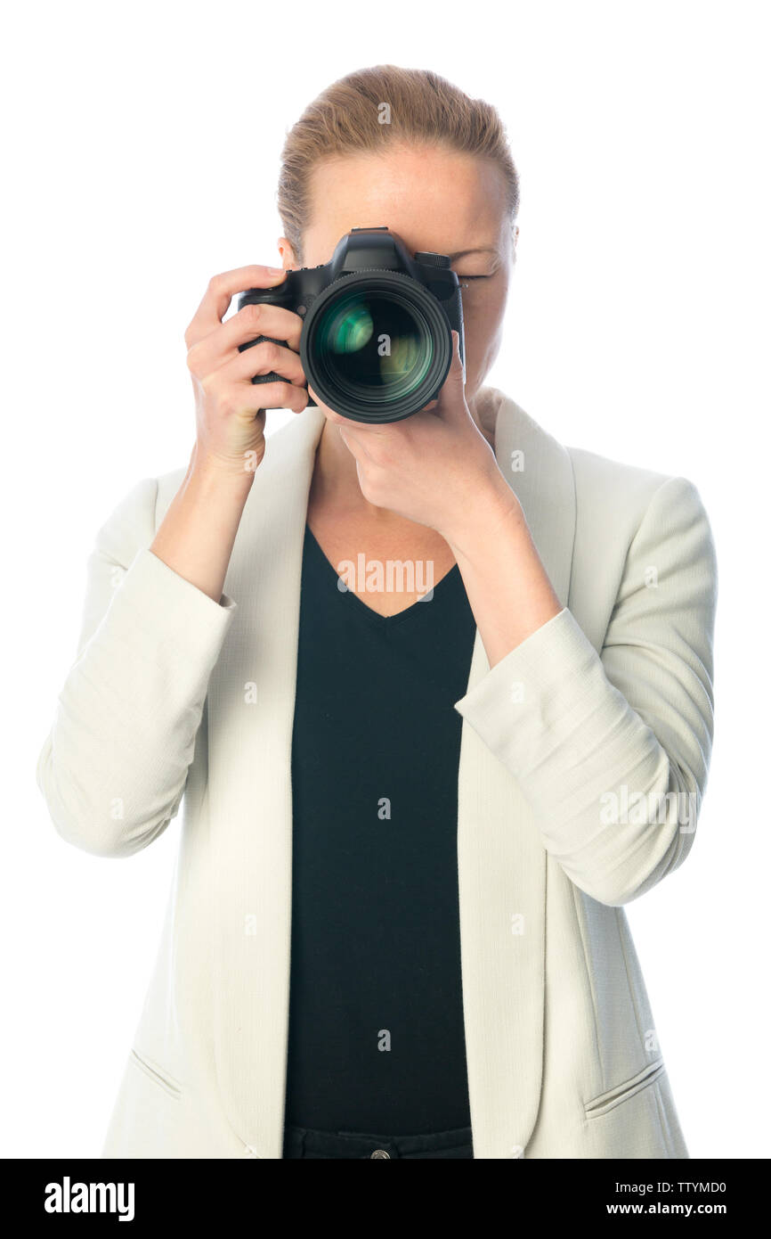 Beautiful young photographer with camera in professional studio Stock ...