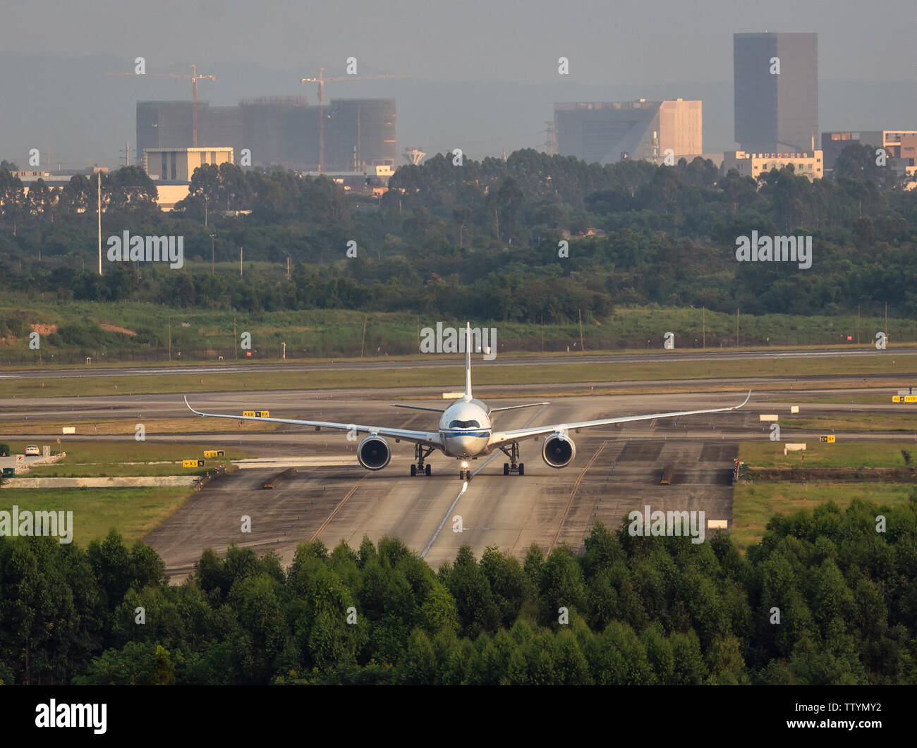 The plane on the runway Stock Photo - Alamy