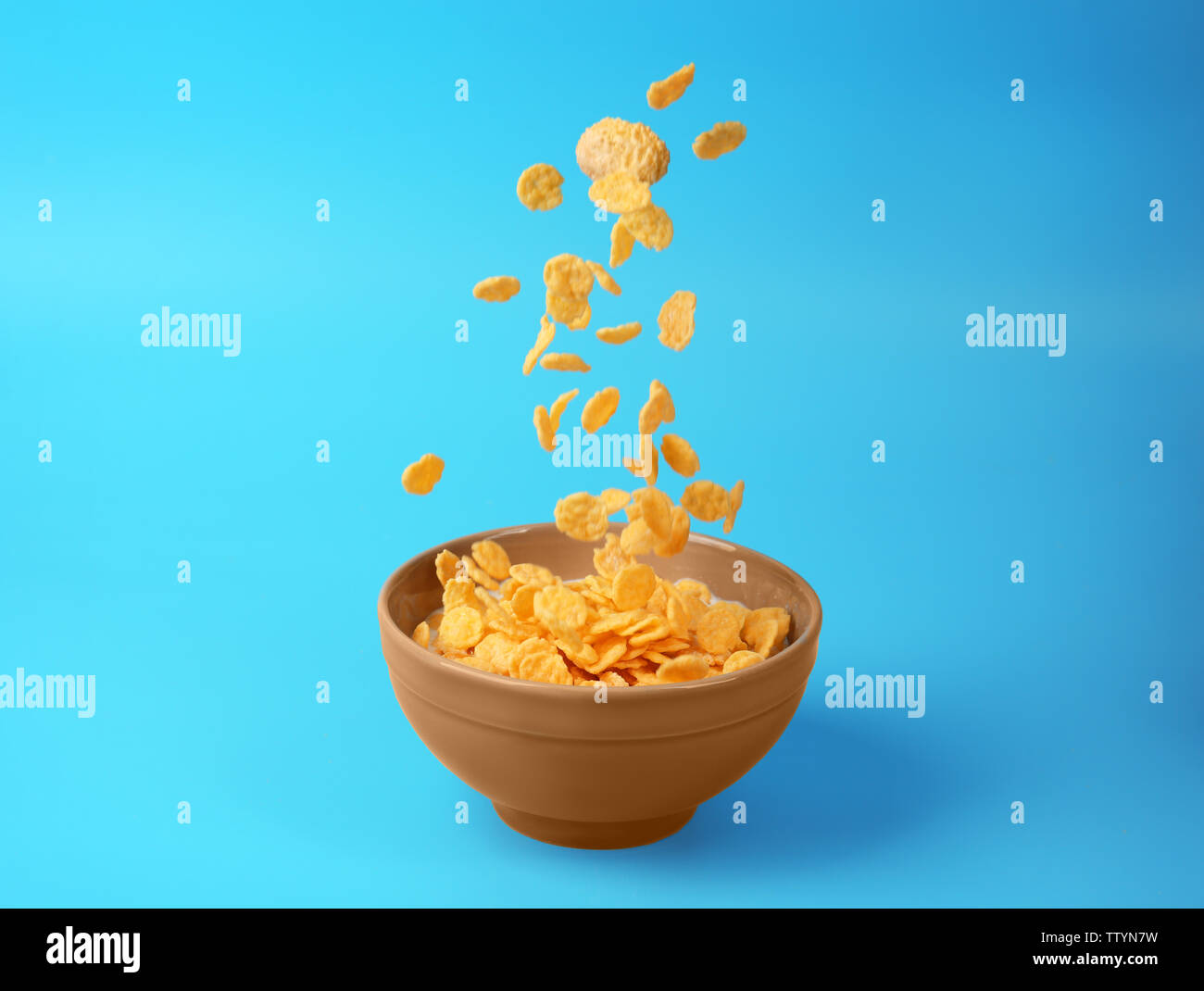 Corn flakes fall bowl on hi-res stock photography and images - Alamy