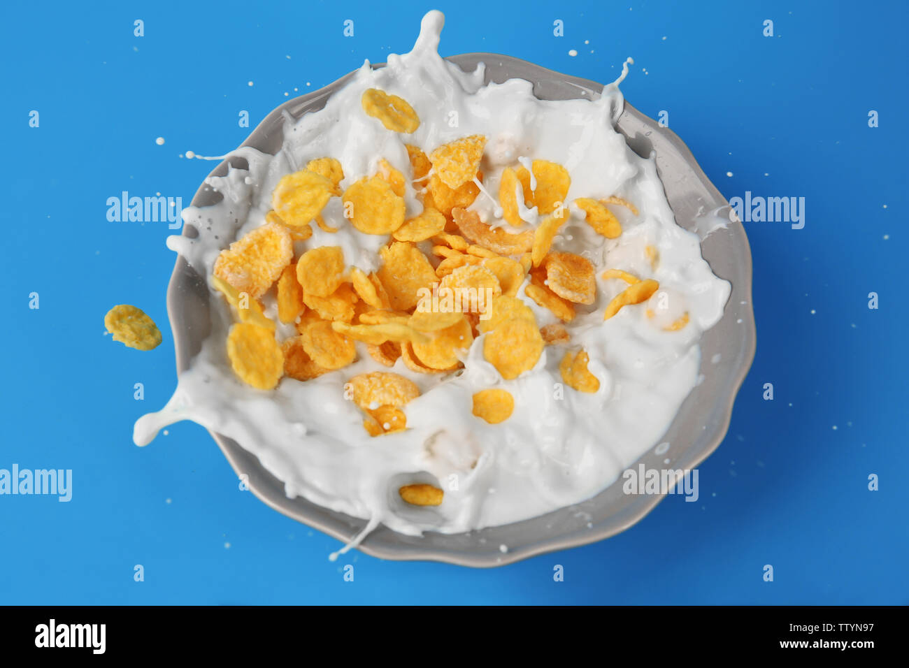 Corn flakes falling in white hi-res stock photography and images - Alamy