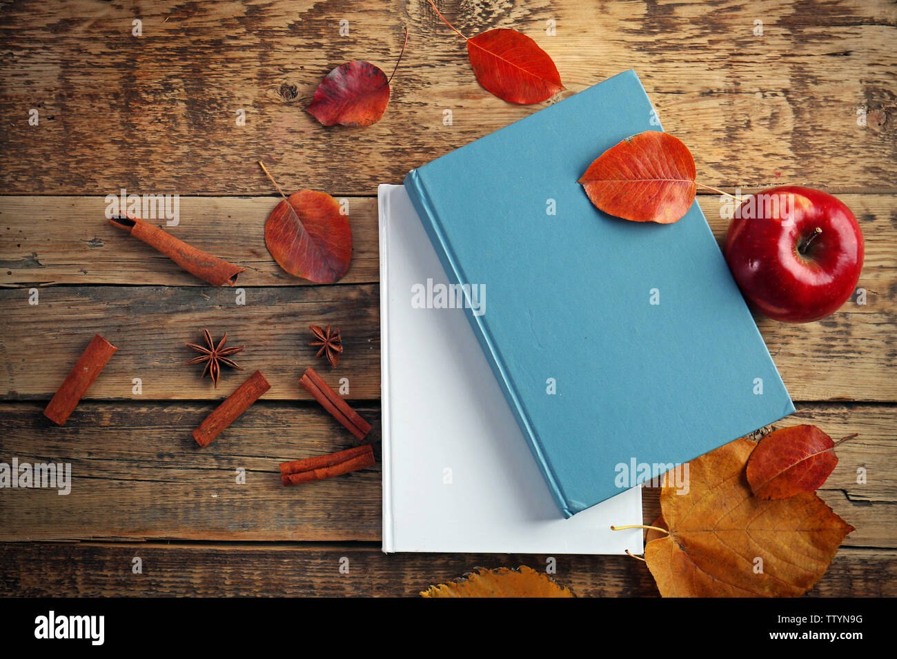 Beautiful autumn composition with books on wooden background Stock ...