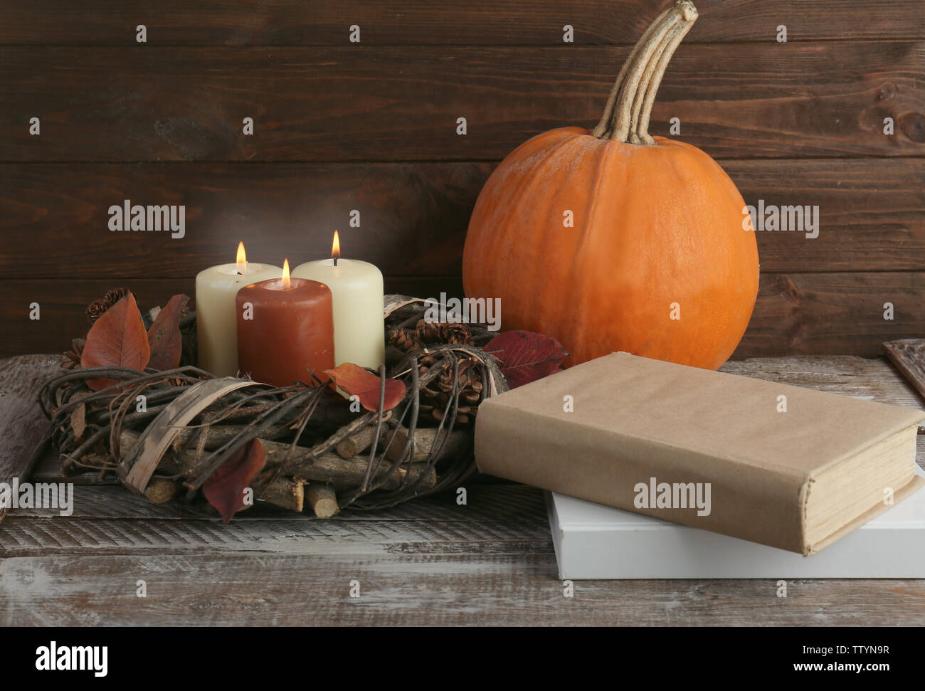 Beautiful autumn composition with pumpkin and books, closeup Stock ...