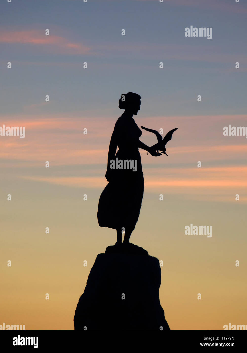 Silhouette of a Lady and the Gull statue, in Opatija, Croatia Stock ...