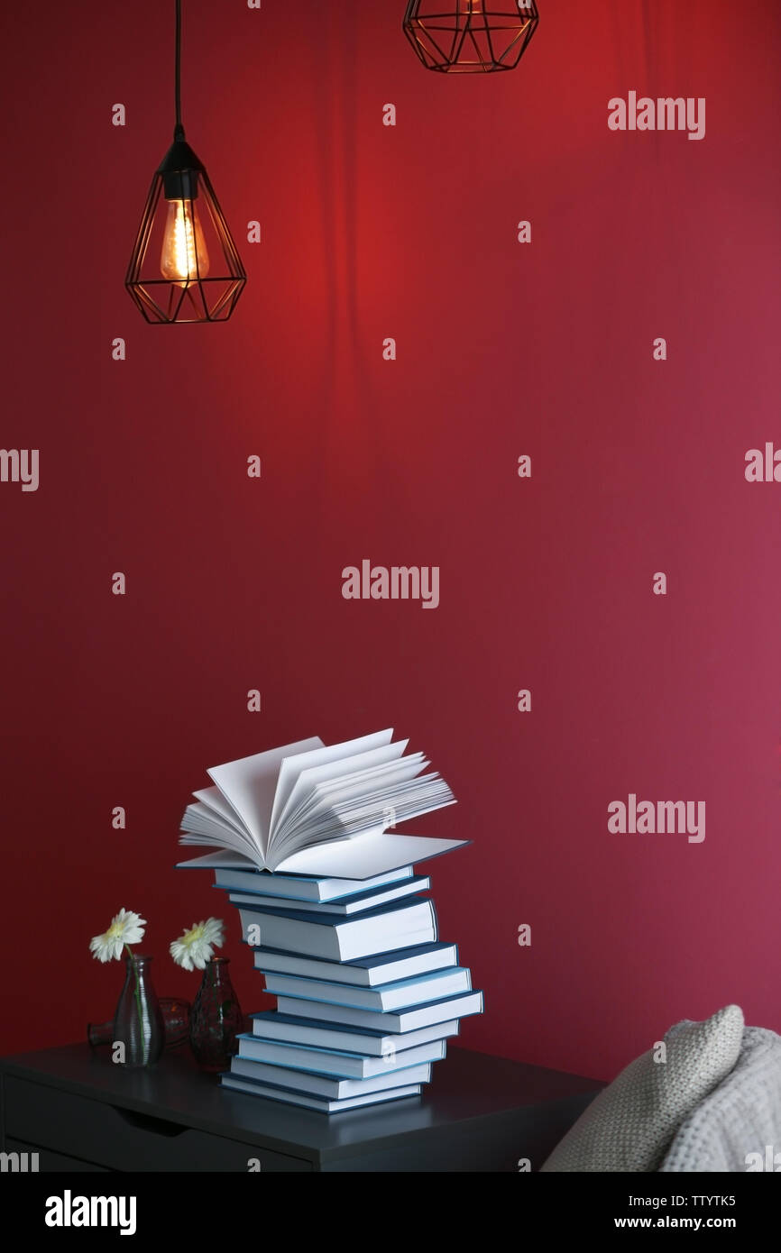 Design interior with stack of books Stock Photo - Alamy