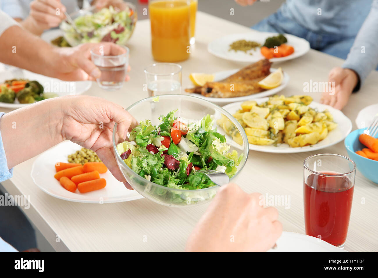 Fish broccoli woman hi-res stock photography and images - Alamy