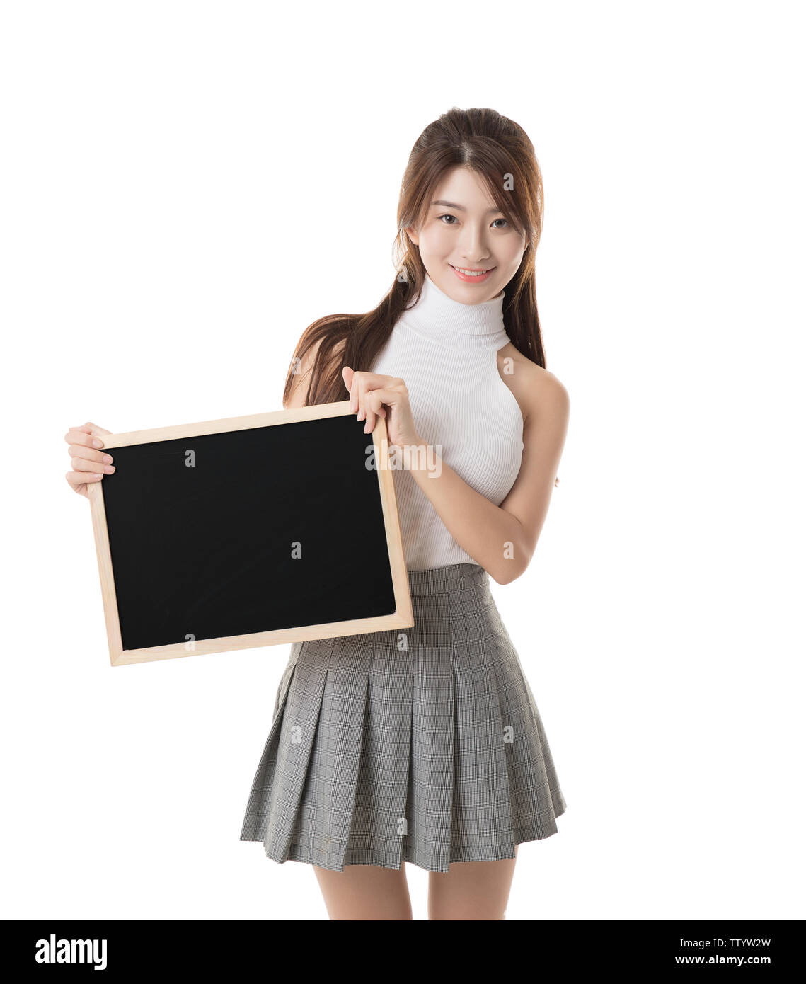 Beautiful cute college student against white background Stock Photo - Alamy