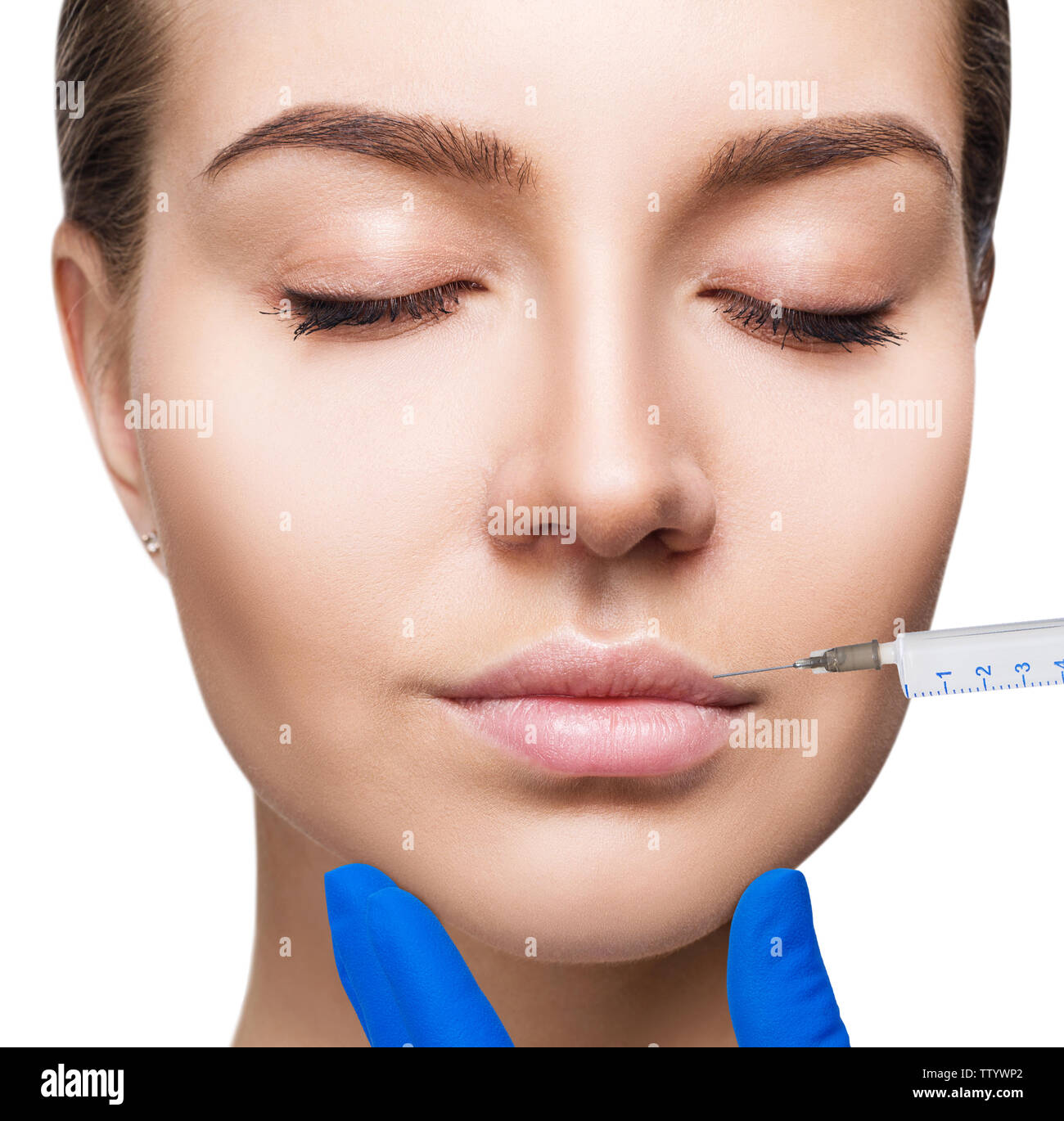 Young woman getting cosmetics injection Stock Photo - Alamy
