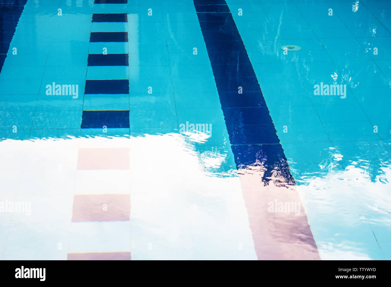Swimming pool under the open sky with the palm trees reflection Stock ...