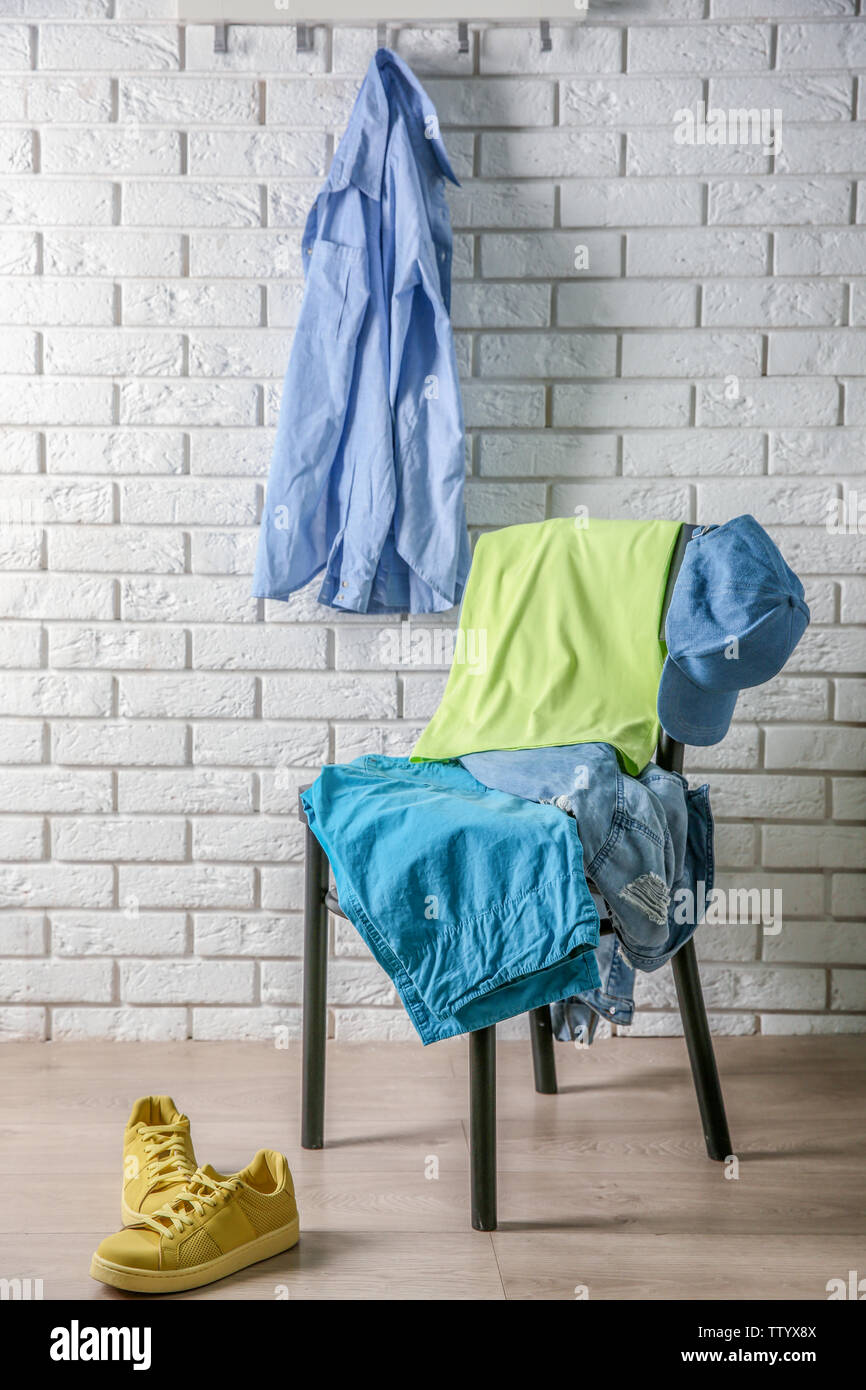 Pile clothes chair hi-res stock photography and images - Alamy