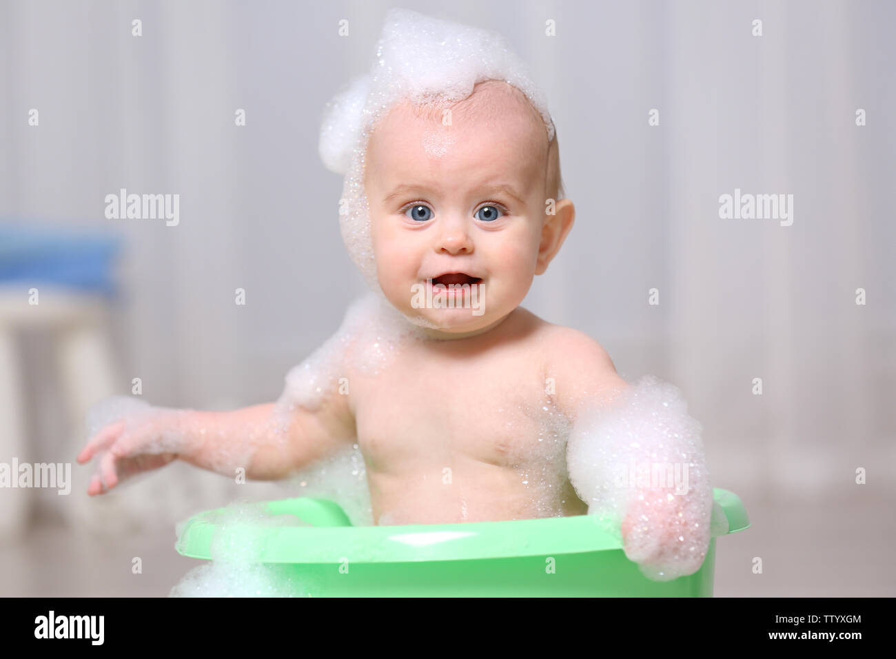 Baby washing bowl hi-res stock photography and images - Alamy