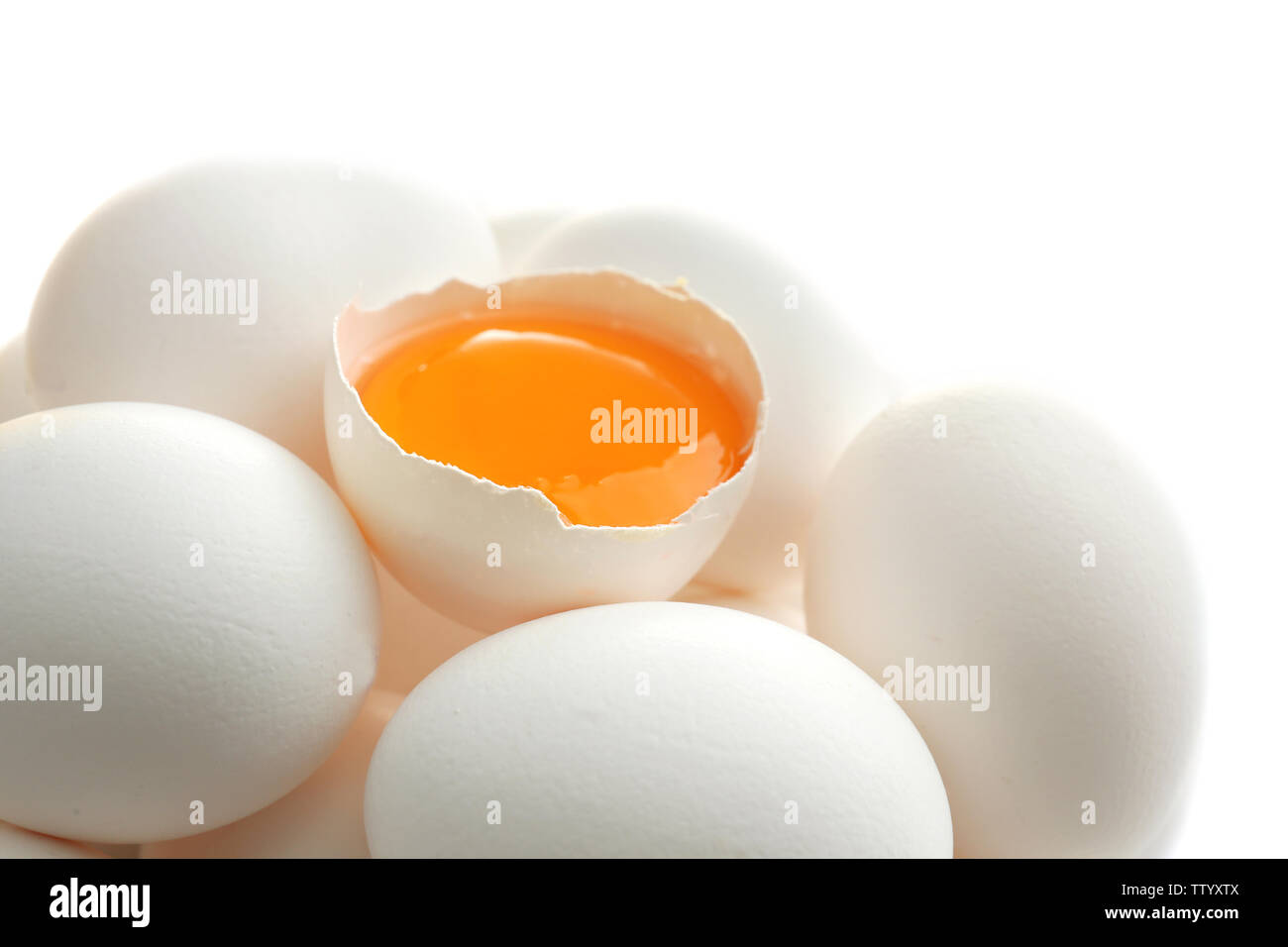 Raw eggs and yolk, closeup Stock Photo - Alamy
