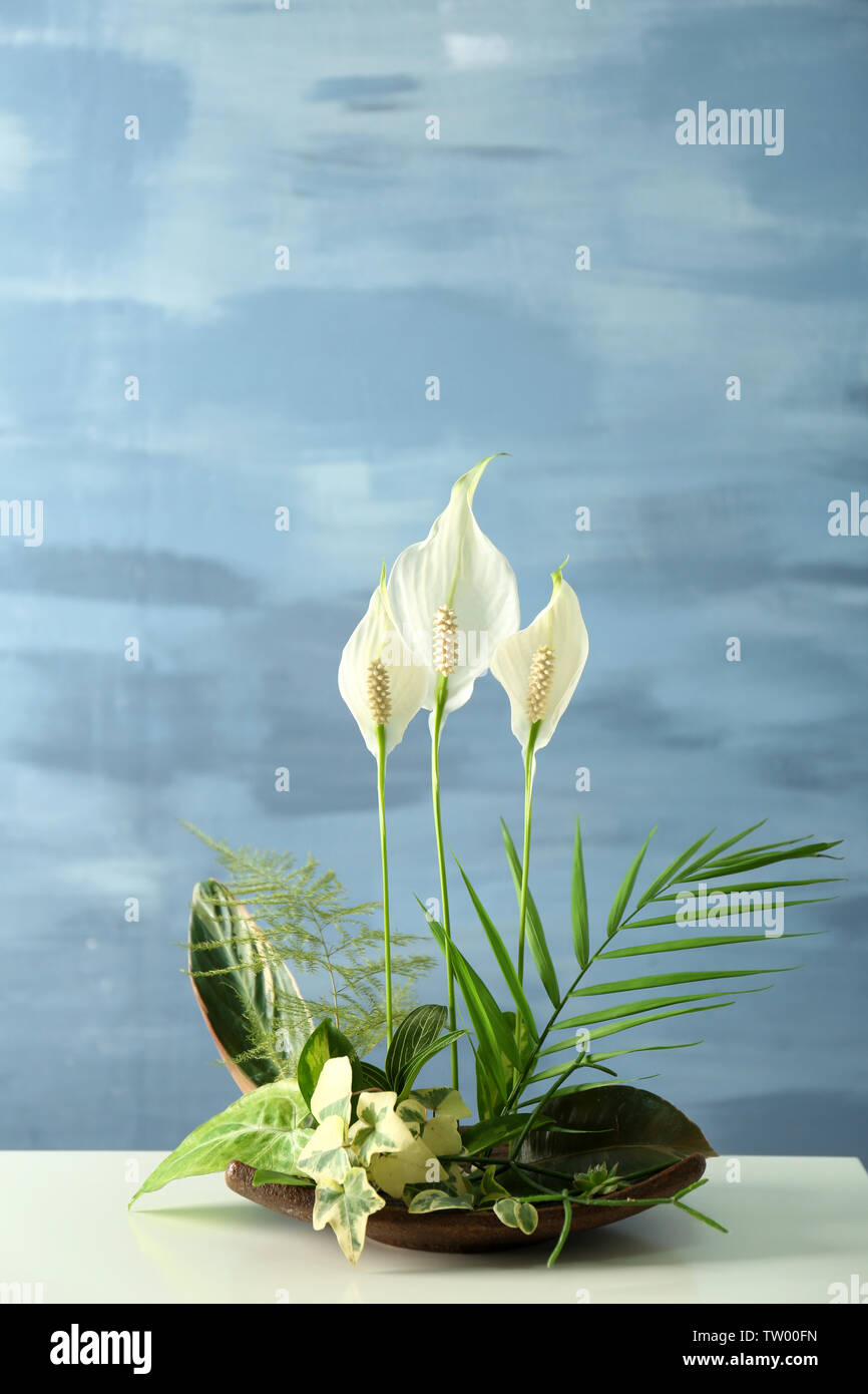 Flower arrangement on a color background Stock Photo - Alamy