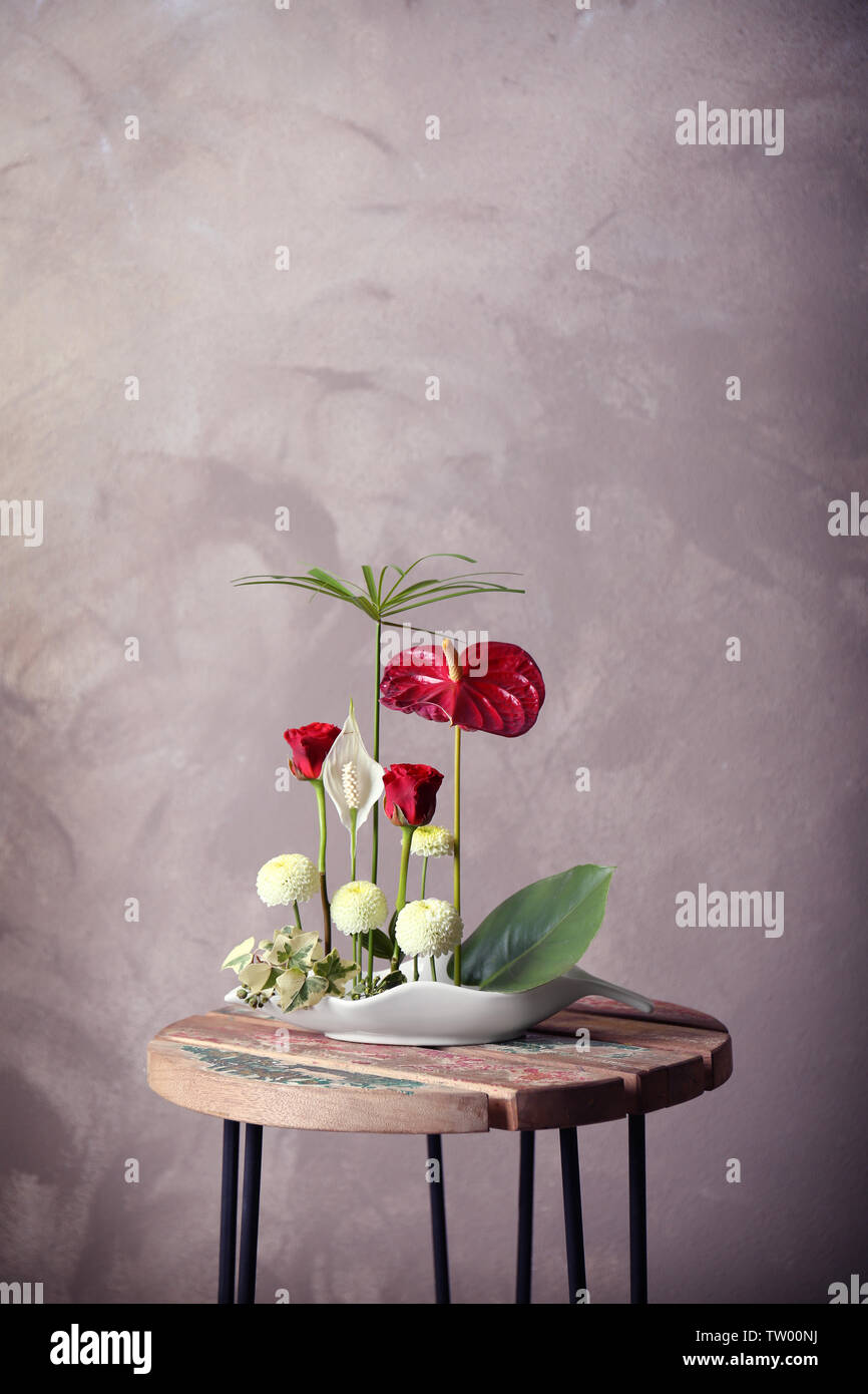 Flower arrangement on a color background Stock Photo - Alamy