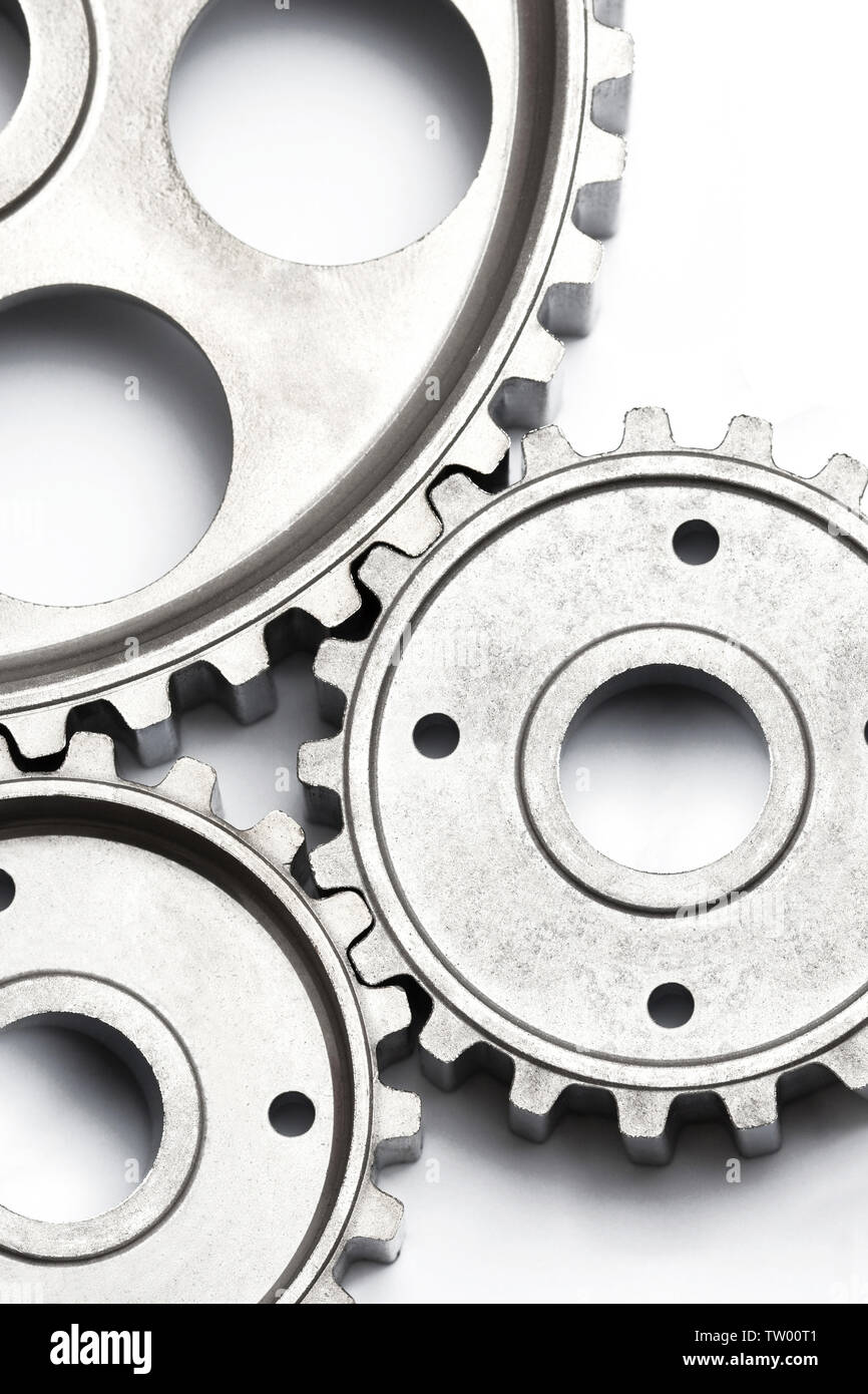 Close up of three cog wheels Stock Photo - Alamy