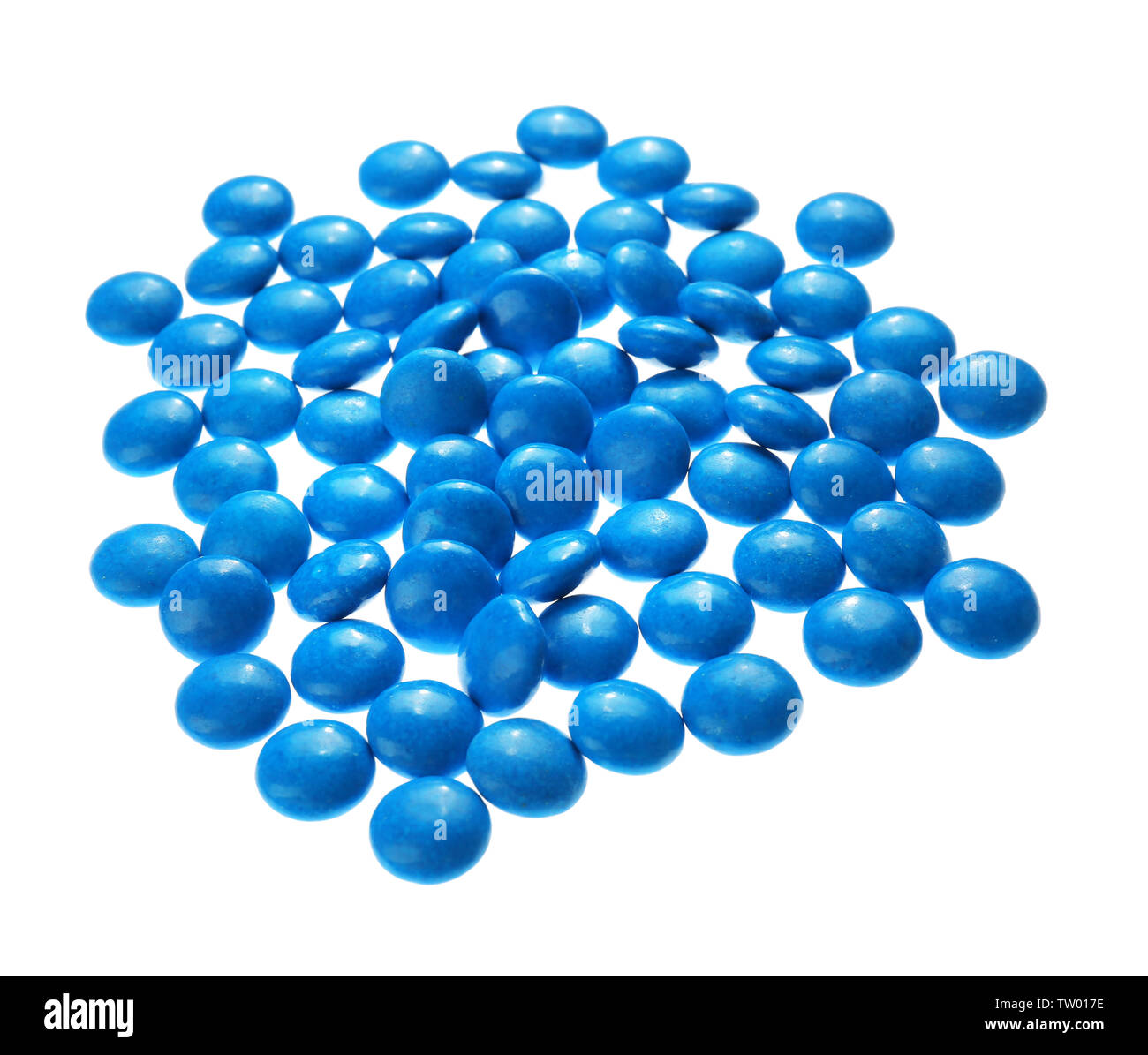 Blue candies on white background Stock Photo - Alamy