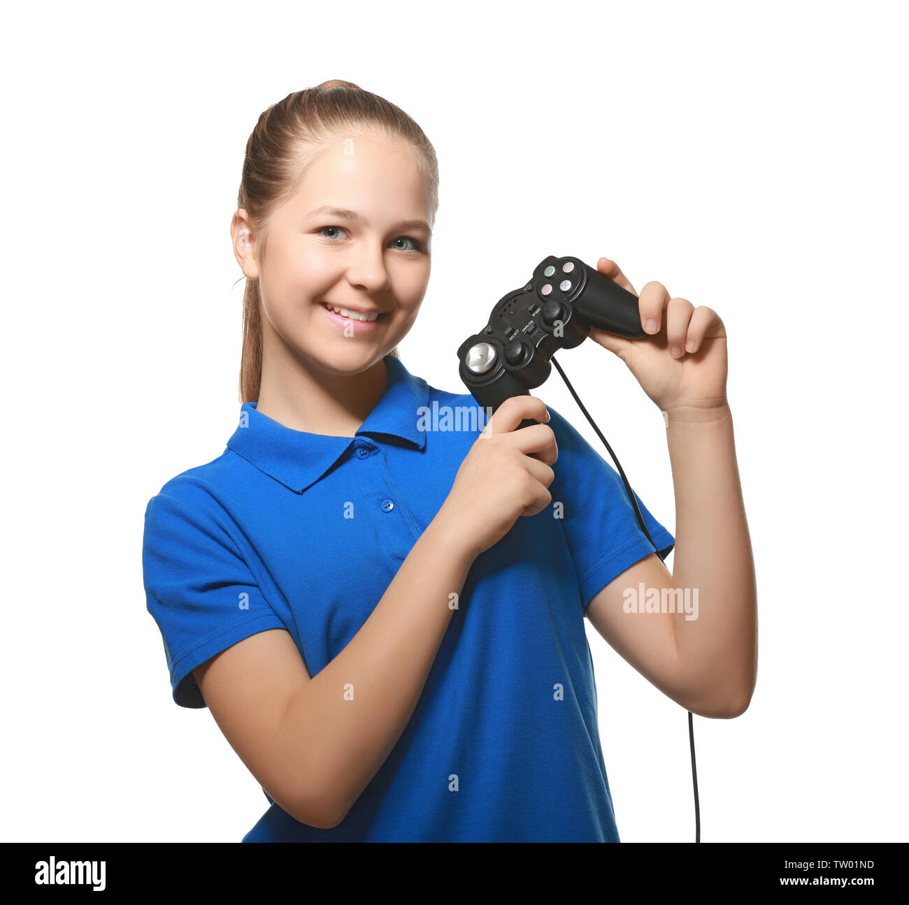 Pretty teenager with game controller on white background Stock Photo ...