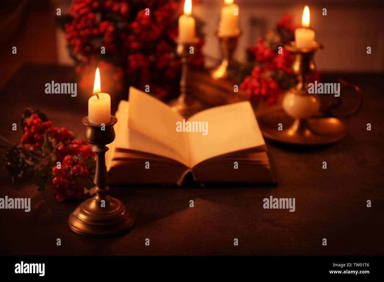 Open bible and candle hi-res stock photography and images - Alamy