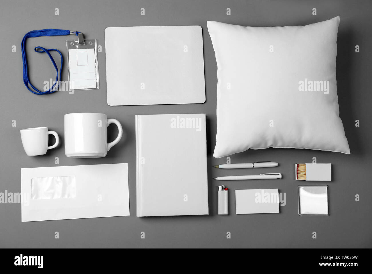 Set of blank items for branding on grey background Stock Photo - Alamy