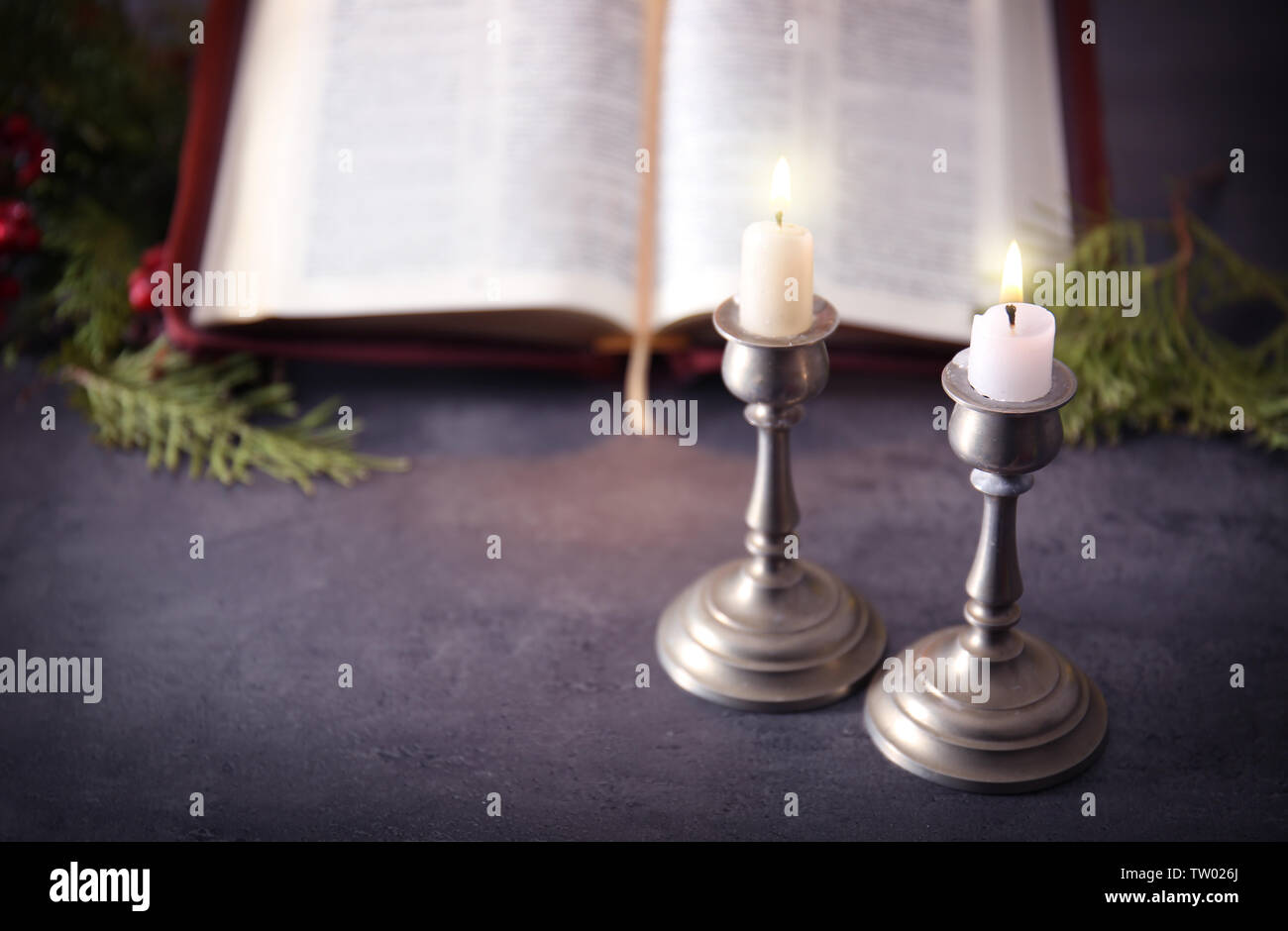 Open bible candles hi-res stock photography and images - Alamy