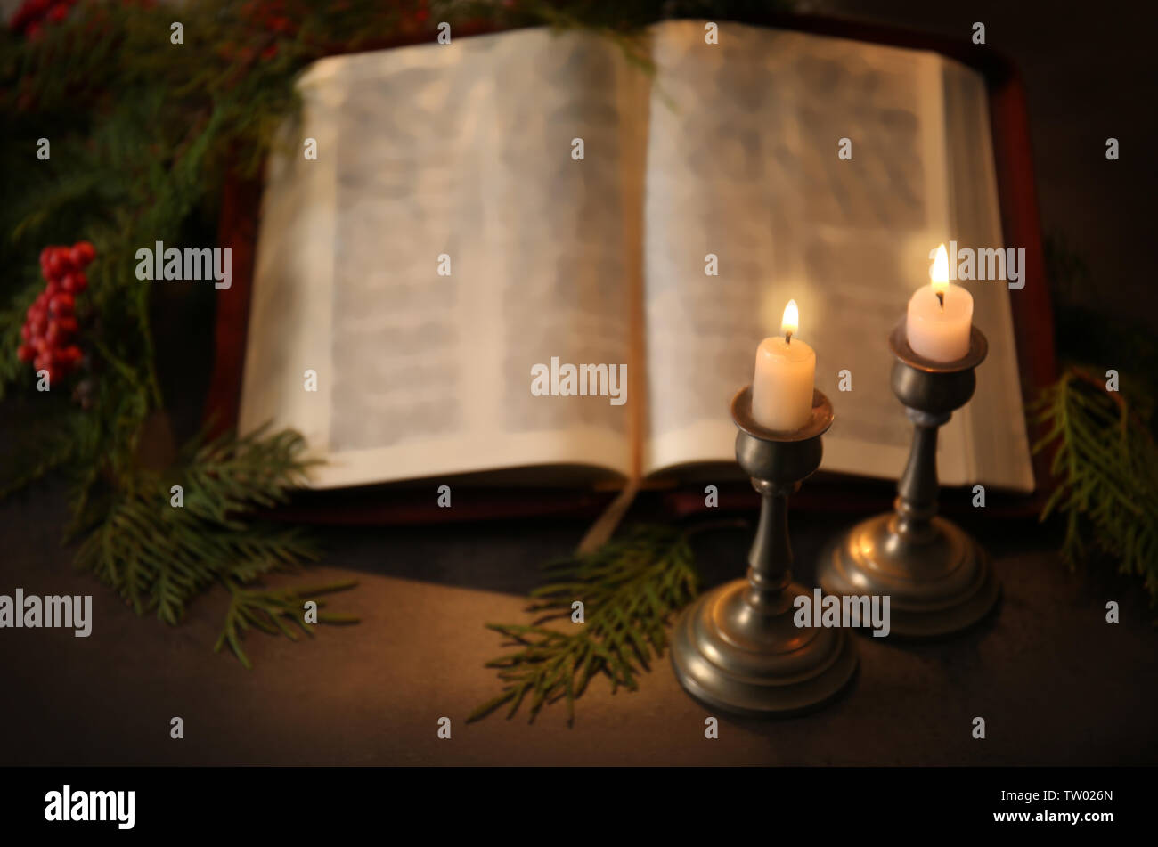 Open bible candles hi-res stock photography and images - Alamy