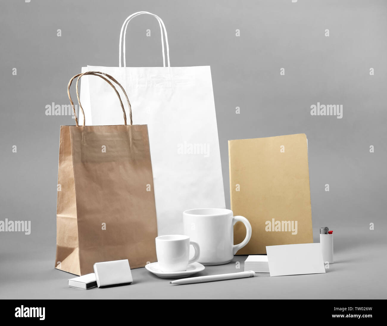 Set of blank items for branding on grey background Stock Photo - Alamy