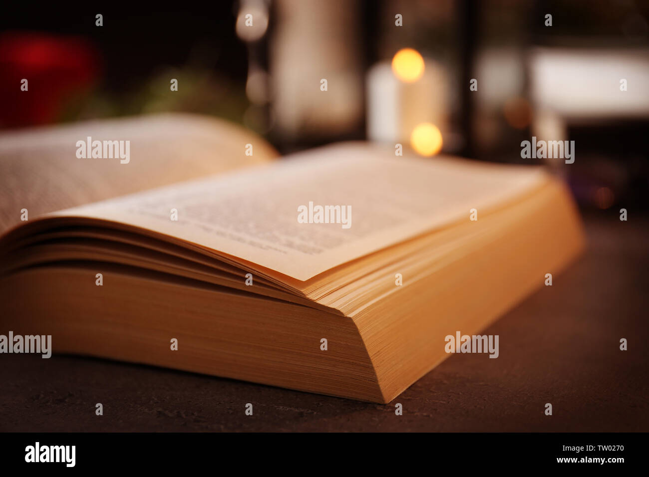 Close up view of open Bible on table Stock Photo - Alamy