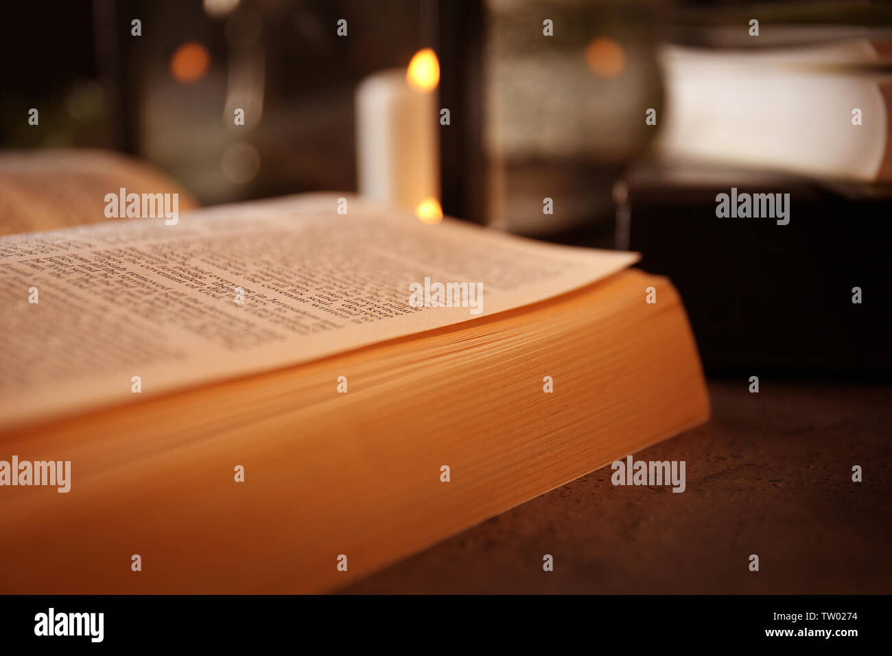 Close up view of open Bible on table Stock Photo - Alamy