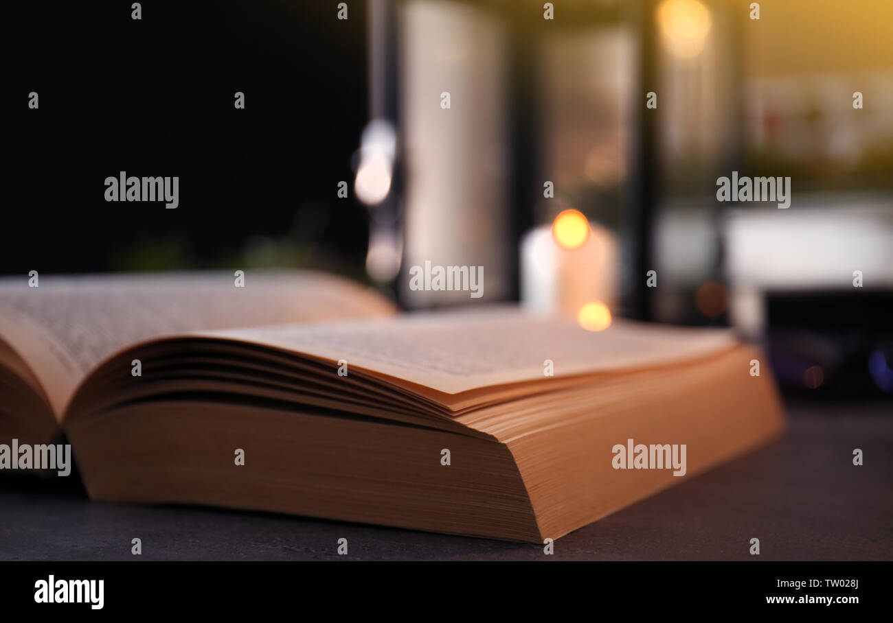 Close up view of open Bible on table Stock Photo - Alamy