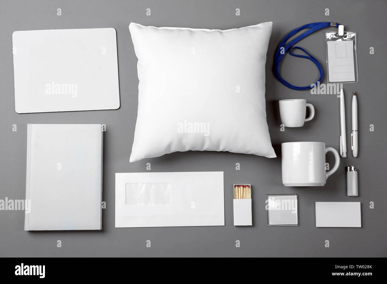 Set of blank items for branding on grey background Stock Photo - Alamy