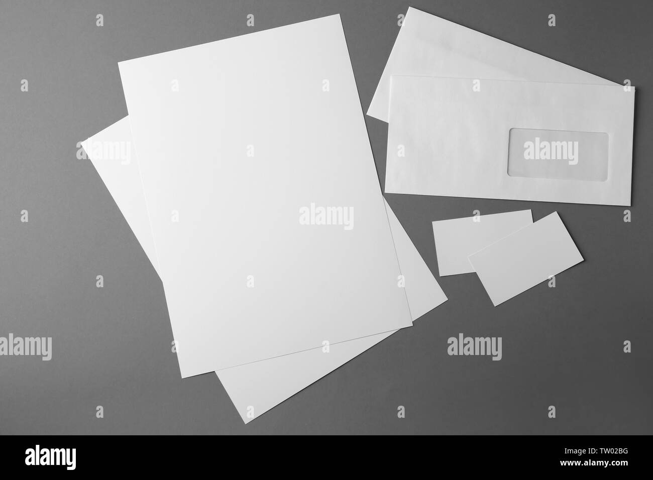 Set of blank items for branding on grey background Stock Photo - Alamy