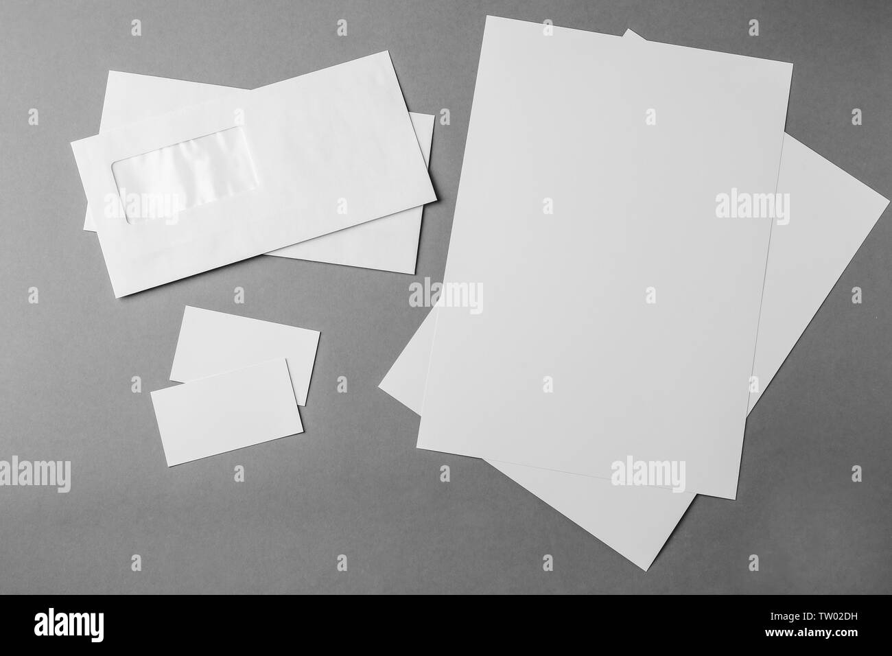 Set of blank items for branding on grey background Stock Photo - Alamy