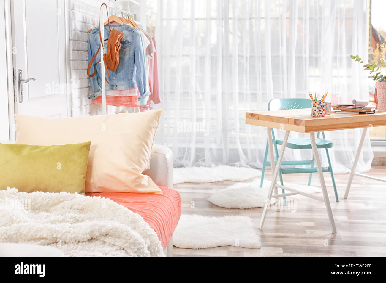 Interior of teenage girl's room with sofa Stock Photo - Alamy