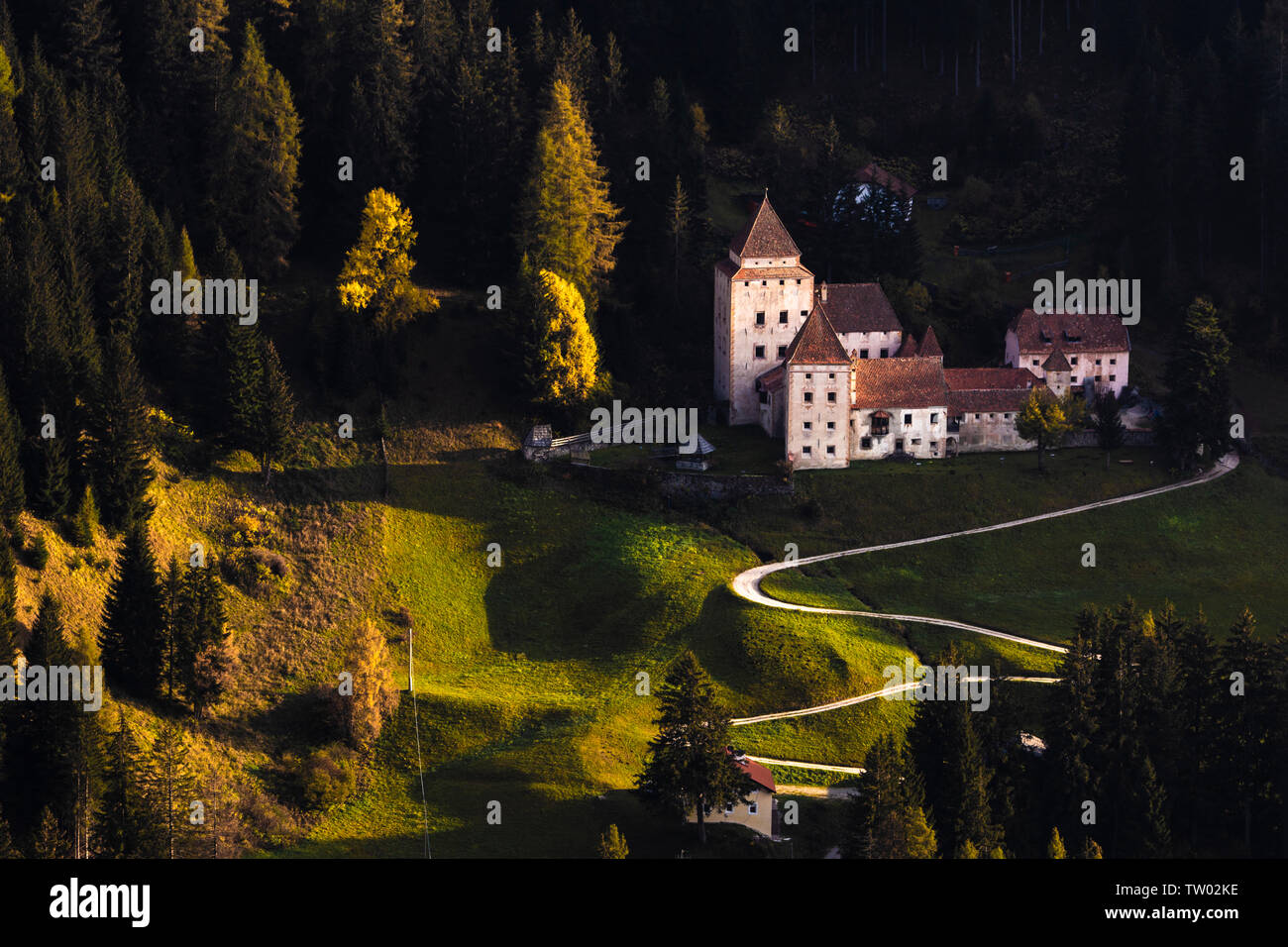 Road to a medieval castle in the Alps Stock Photo - Alamy