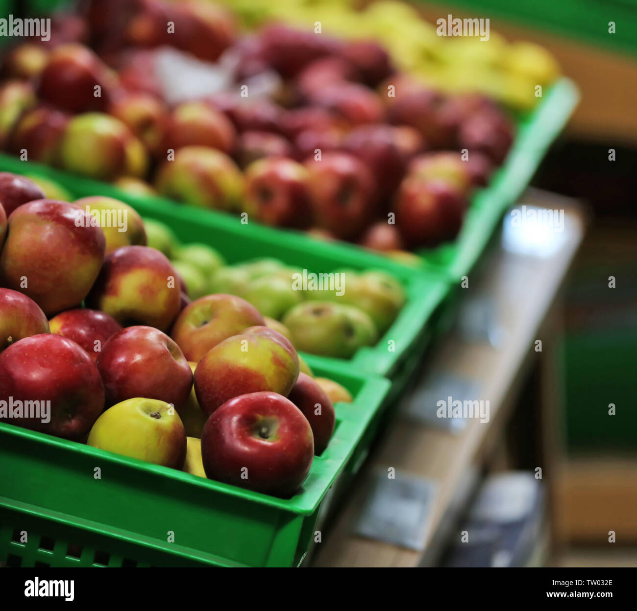 Fresh fruit in plastic boxes on market Stock Photo - Alamy