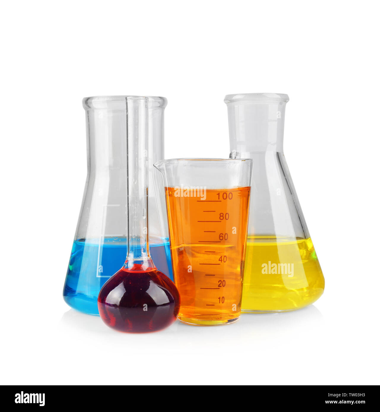 Different chemical glassware with color water on white background Stock ...