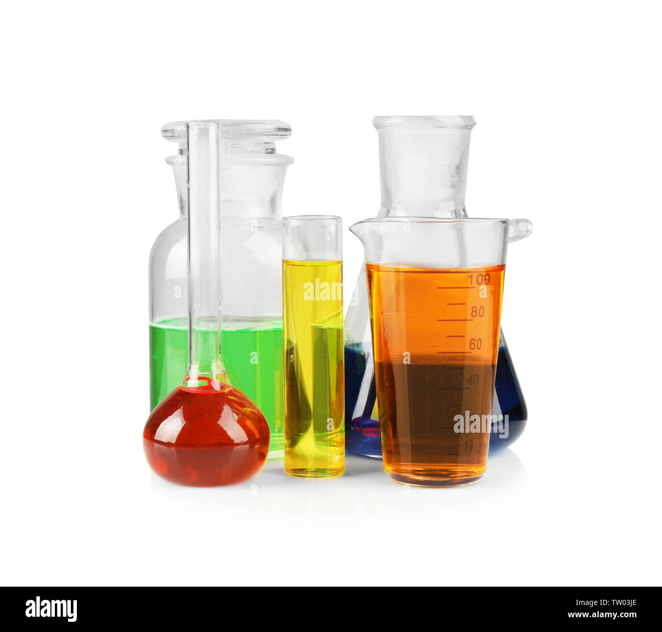 Different chemical glassware with color water on white background Stock ...