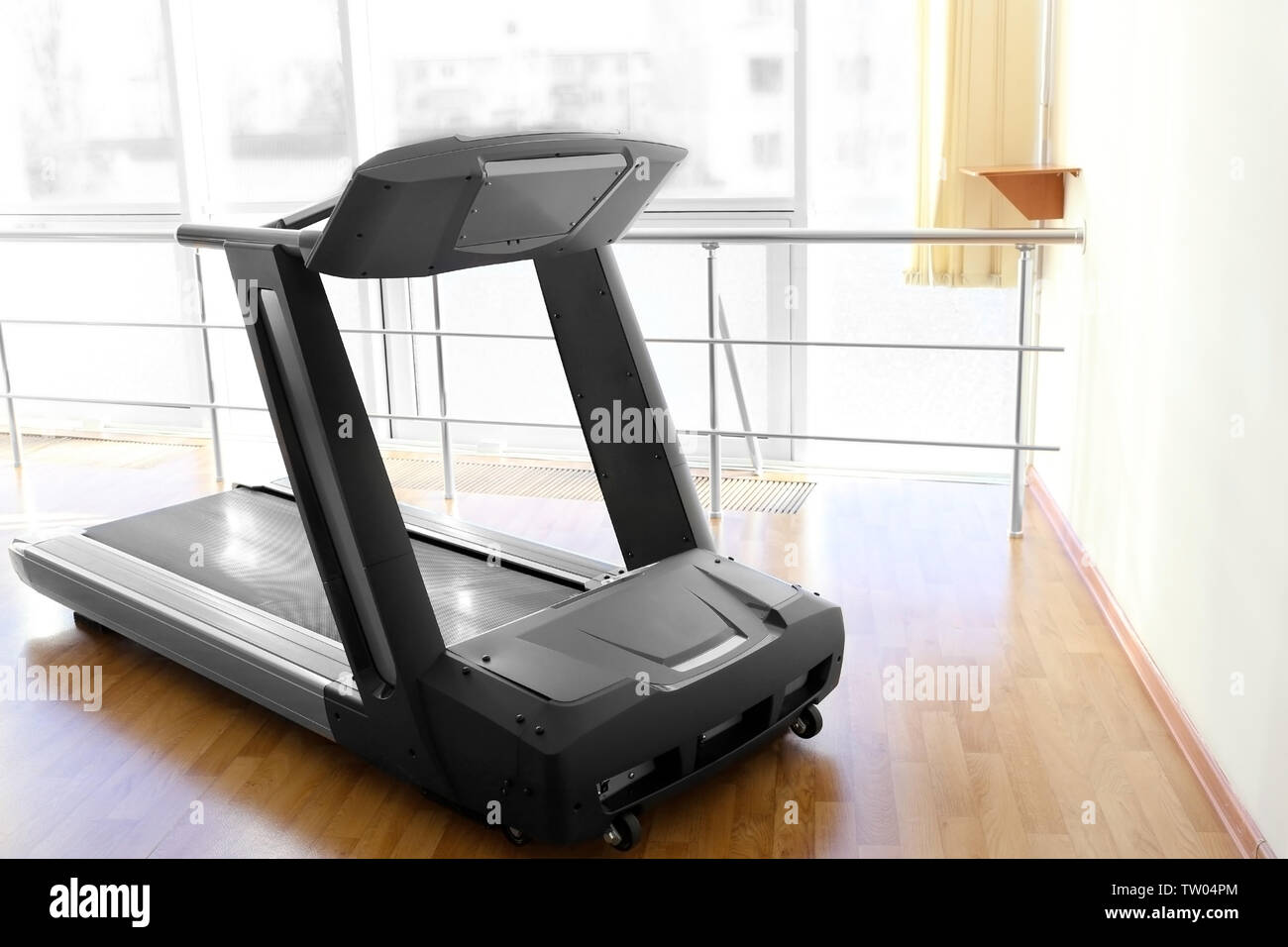 Modern treadmill in gym Stock Photo - Alamy
