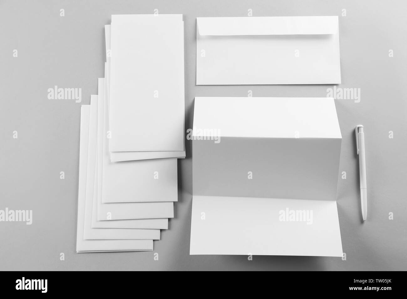 Set of blank items for branding on light background Stock Photo - Alamy