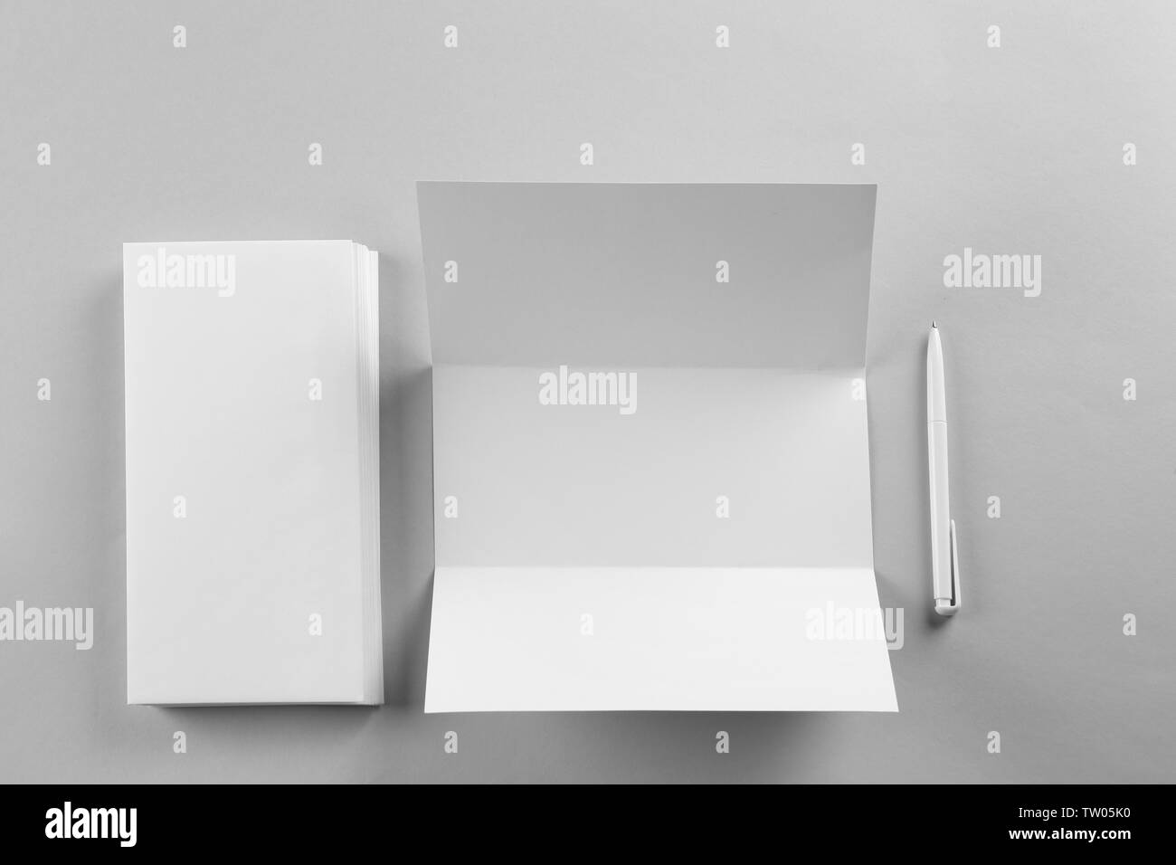 Set of blank items for branding on light background Stock Photo - Alamy