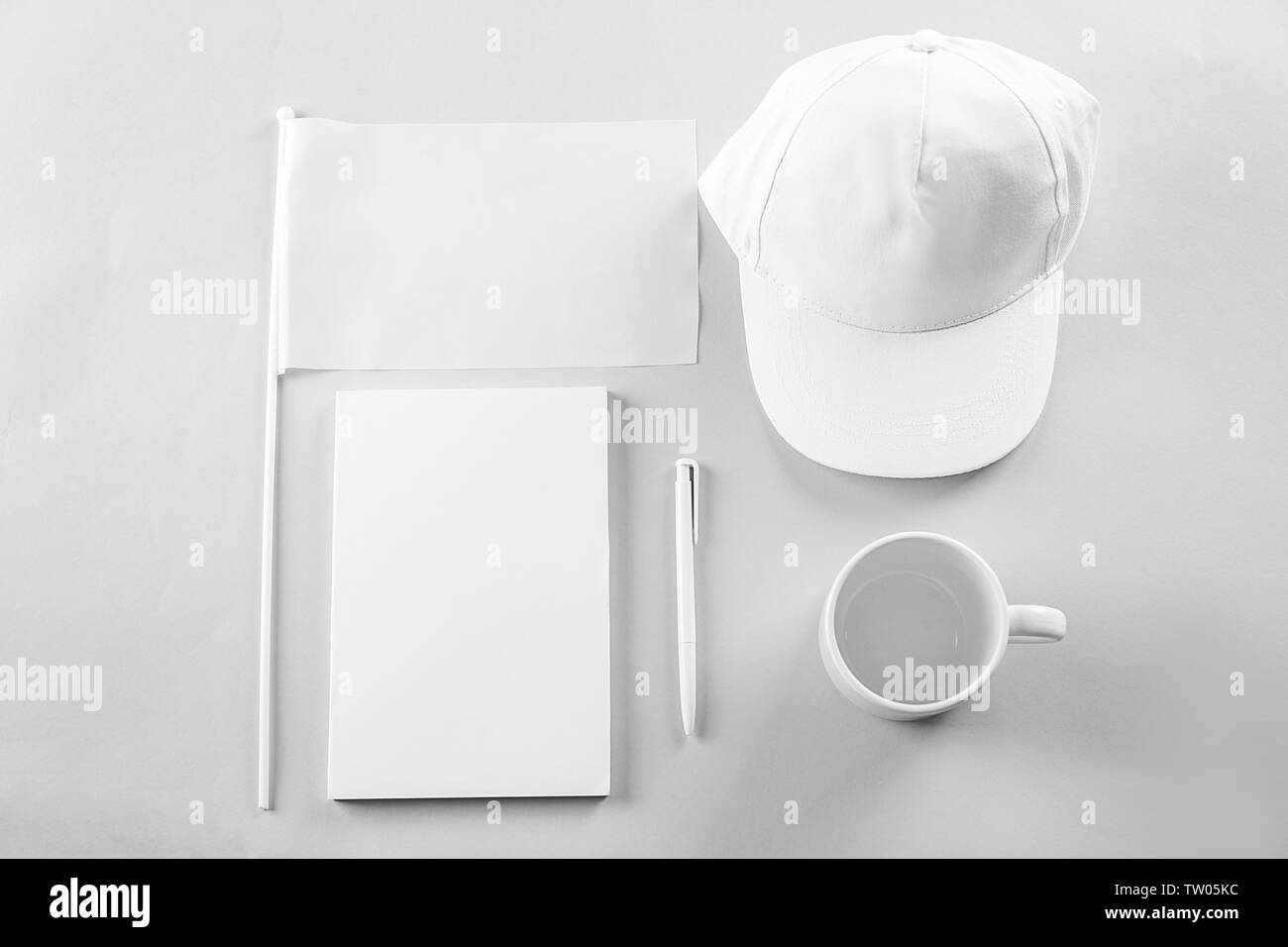 Set of blank items for branding on light background Stock Photo - Alamy