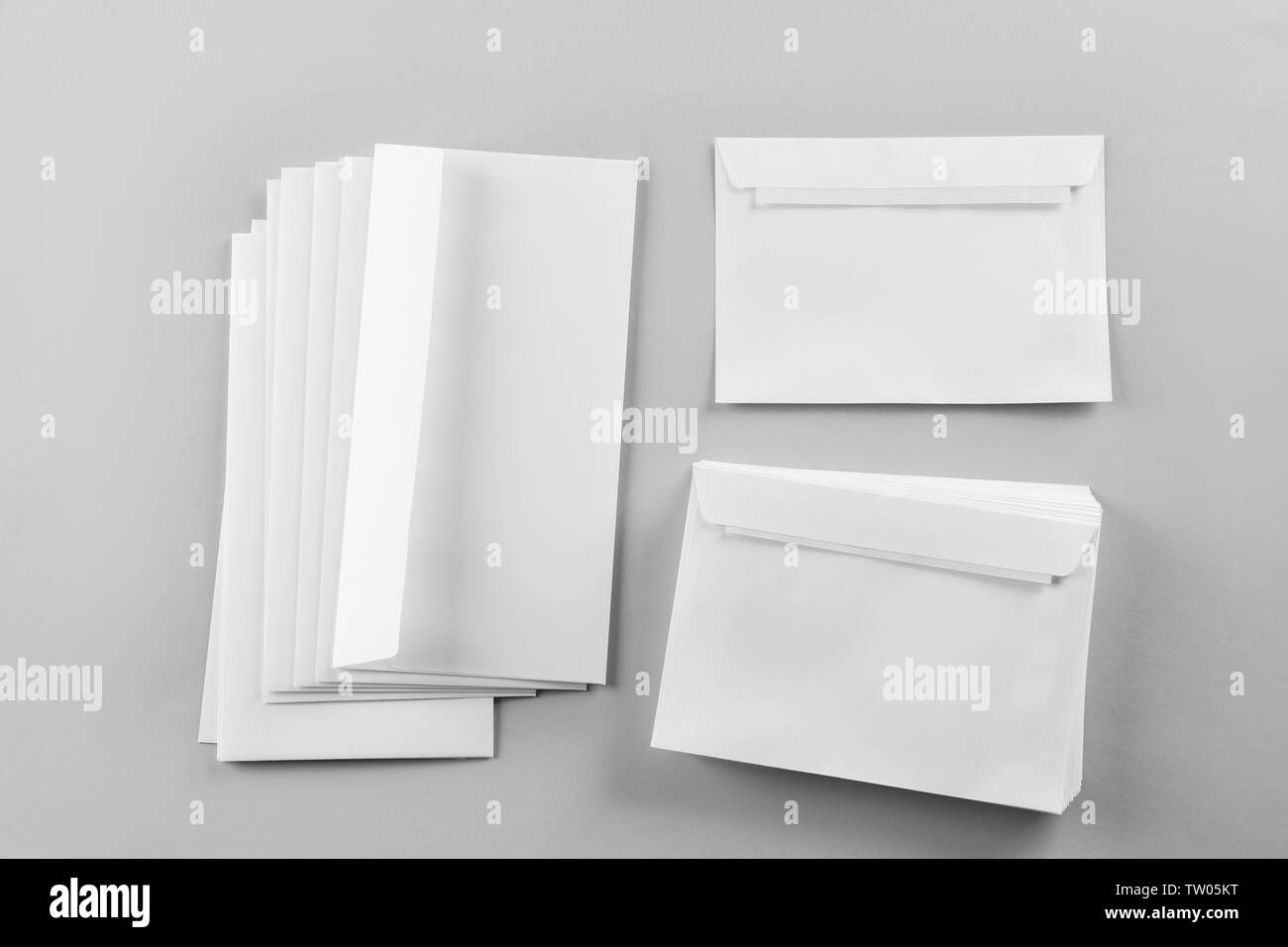 Set of blank items for branding on light background Stock Photo - Alamy