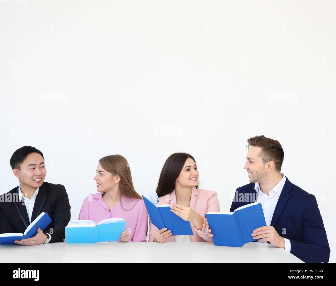 Diverse group of teens reading hi-res stock photography and images - Alamy