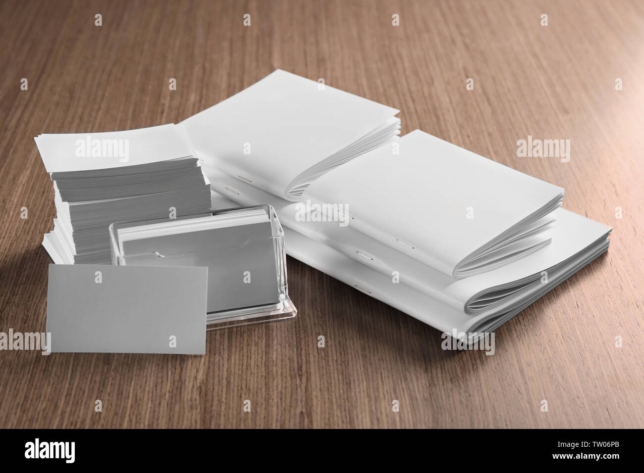 Blank goods on wooden table Stock Photo - Alamy