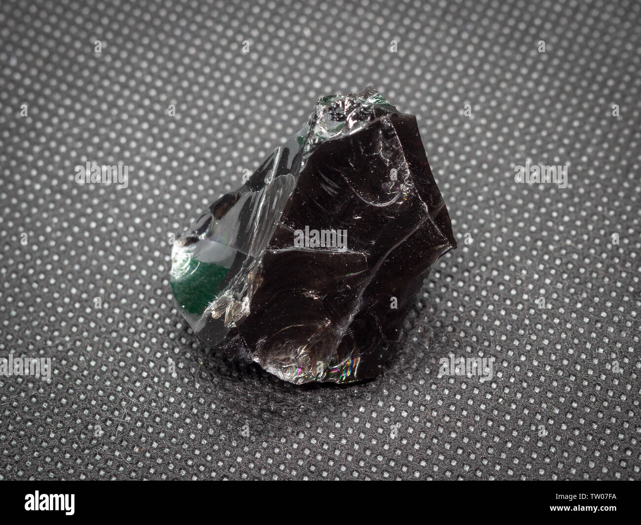 Geological specimen of natural black layered mineral obsidian (aka ...