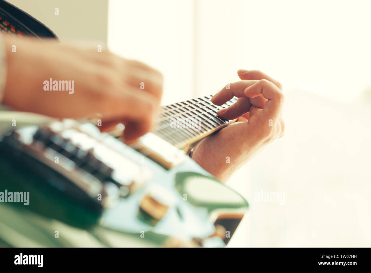 man playing electric guitar Stock Photo - Alamy