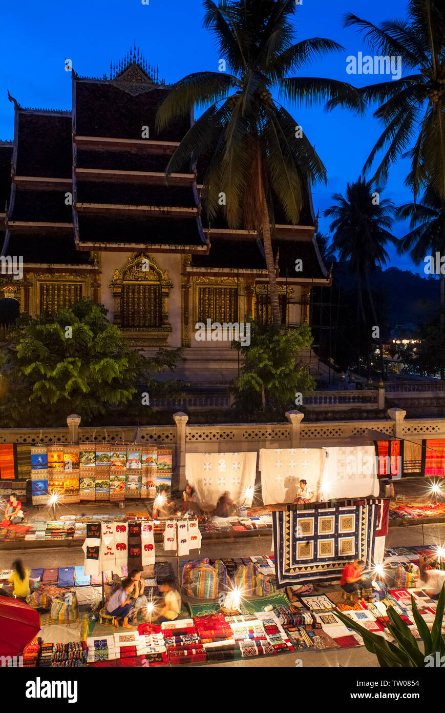 The Hmong Night Market with Haw Pha Bang temple in the background Stock ...