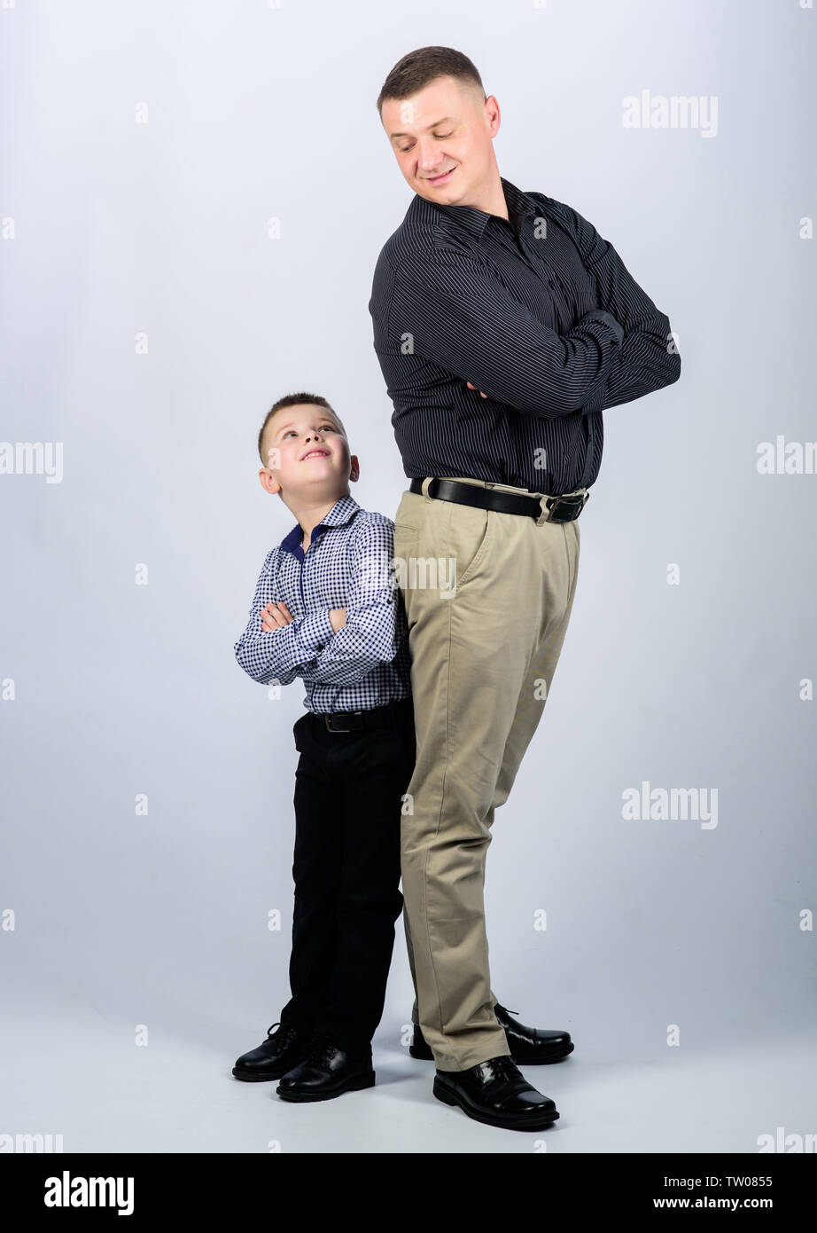 little boy with dad businessman. father and son in business suit ...