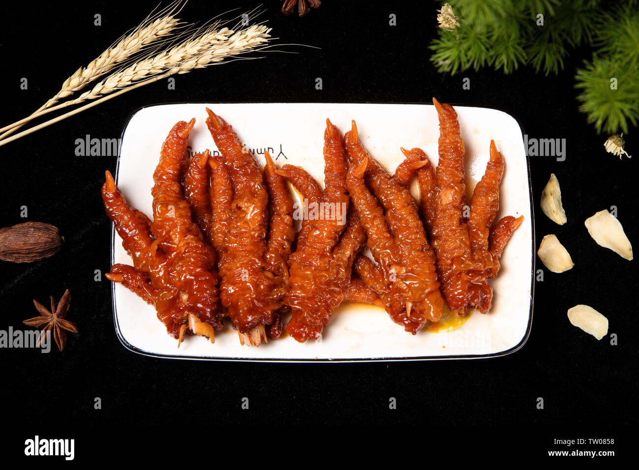 Tiger skin, phoenix claws, halogen chicken claws Stock Photo - Alamy