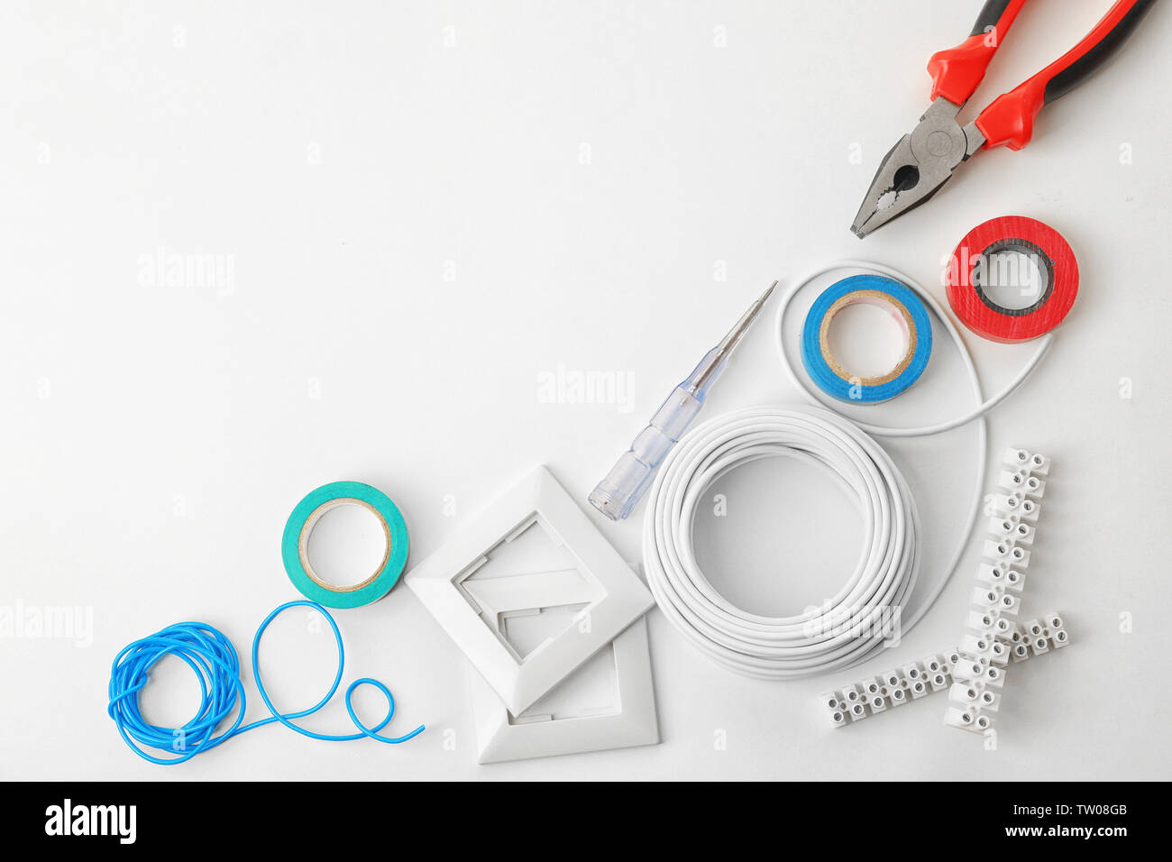 Different electrical tools on white background Stock Photo - Alamy