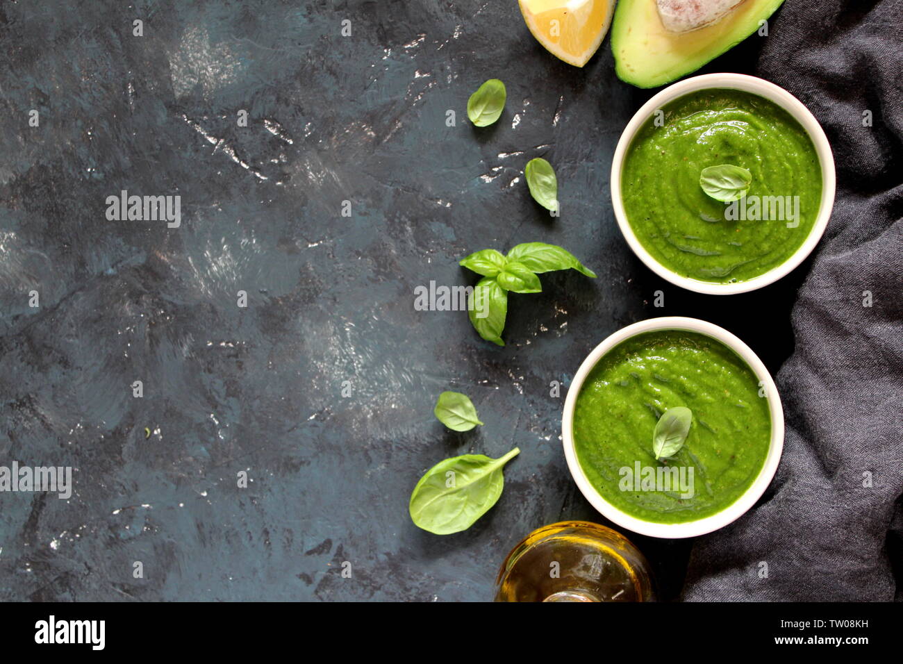Avocado smoothie with spinach. Top view with copy space. Diet food ...